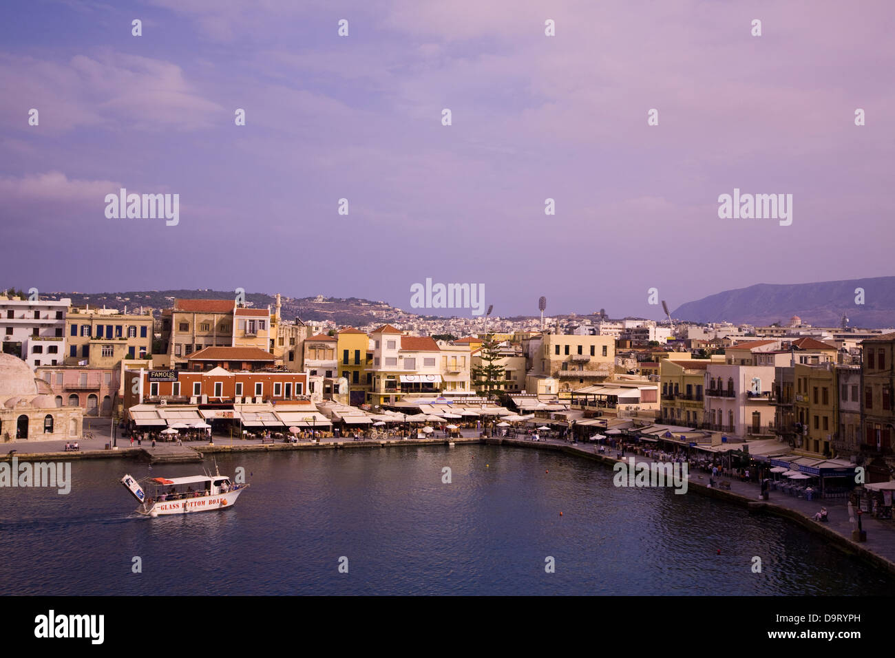 A broad promenade lined with tourist shops and cafes circles the lovely ...