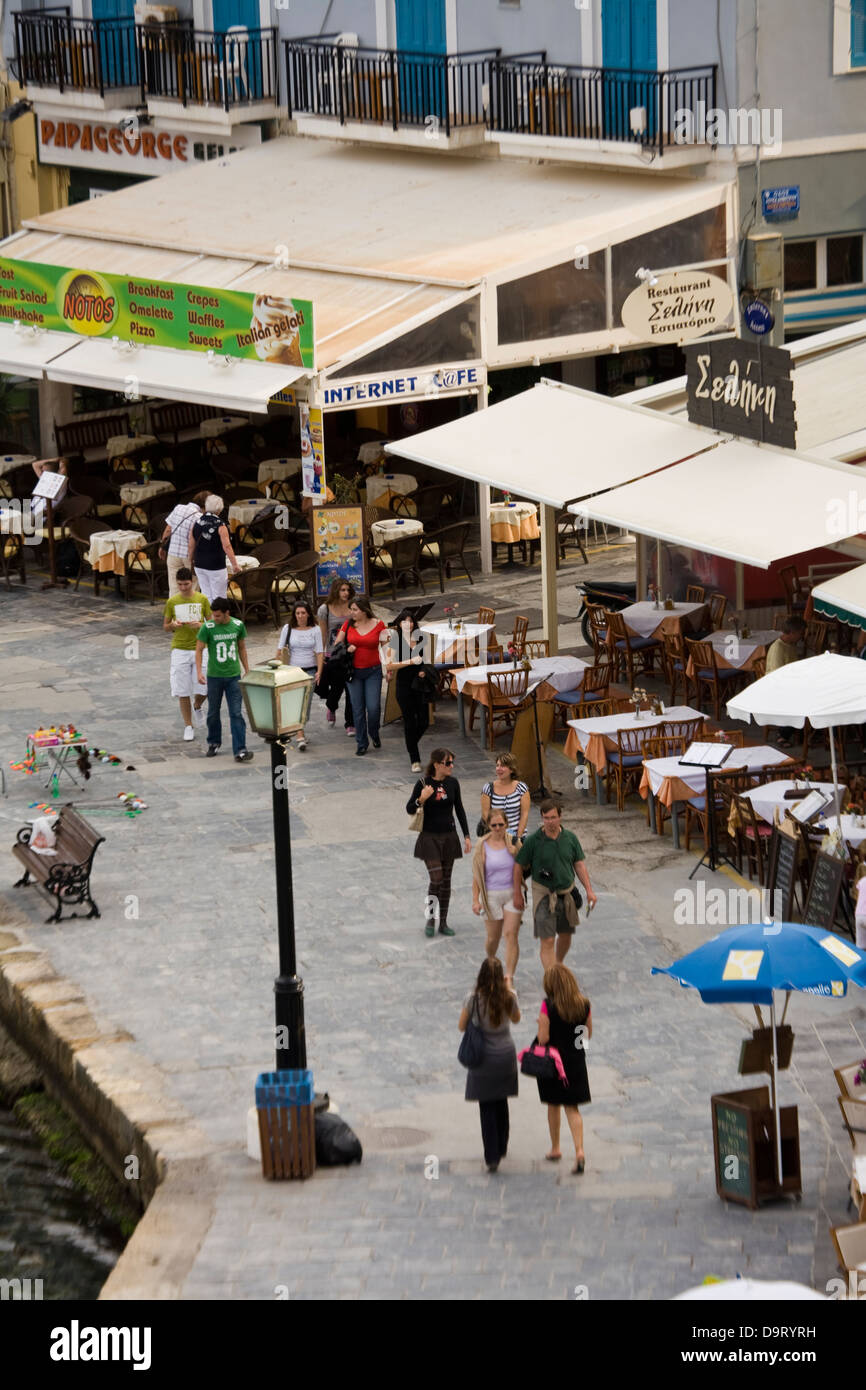 A broad promenade lined with tourist shops and cafes circles the lovely ...
