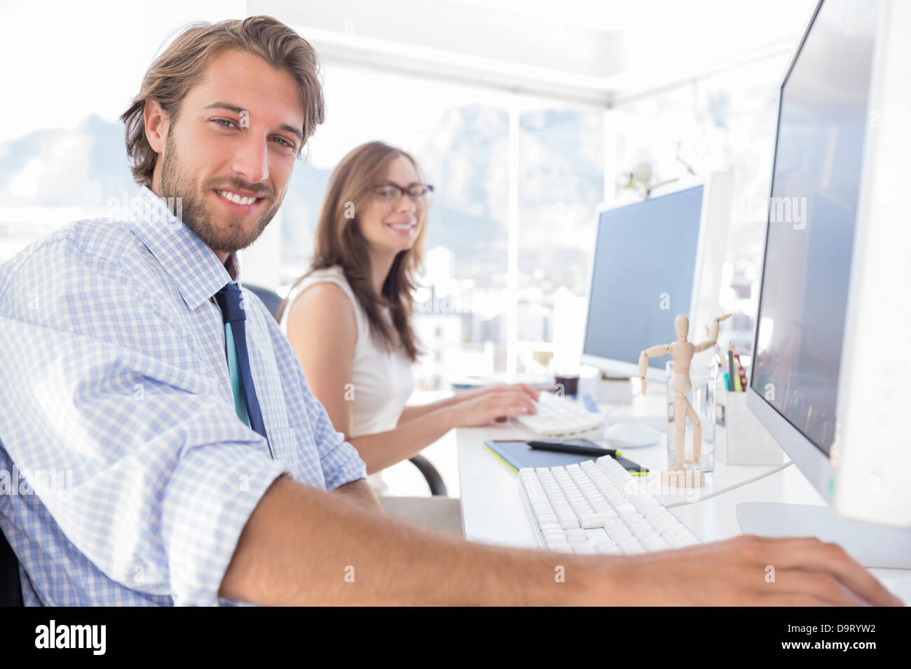 Attractive designers at work Stock Photo - Alamy
