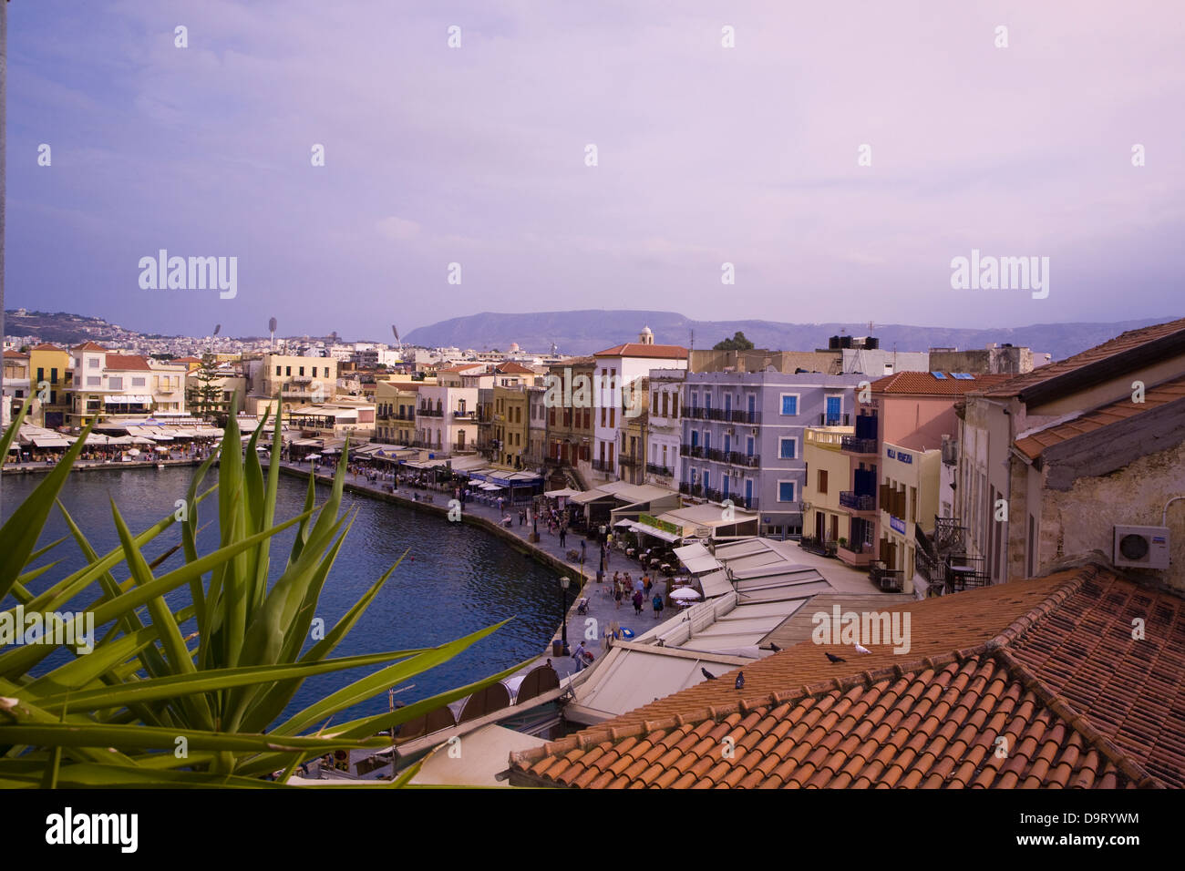 A broad promenade lined with tourist shops and cafes circles the lovely ...