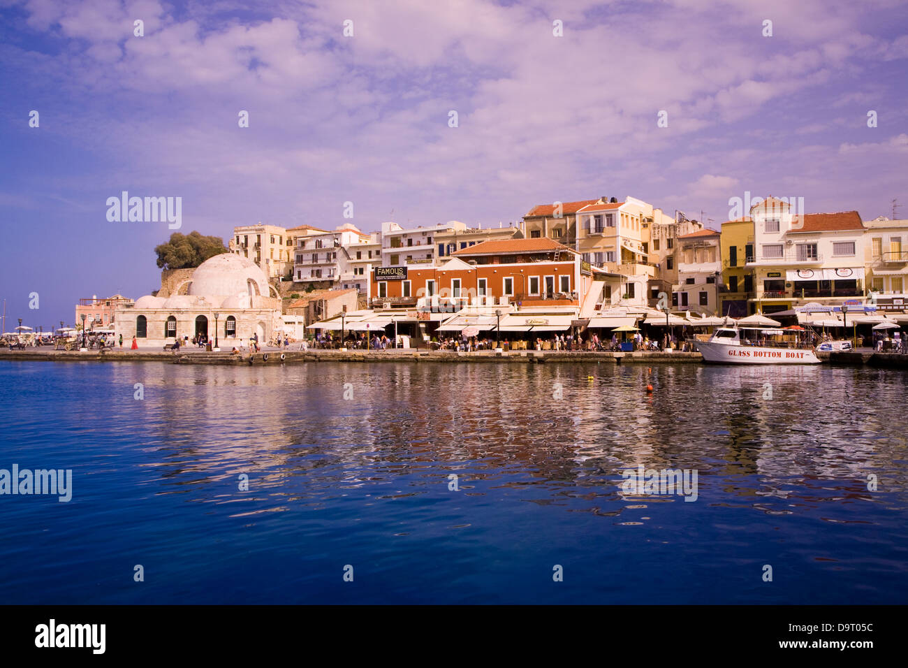 A broad promenade lined with tourist shops and cafes circles the lovely ...