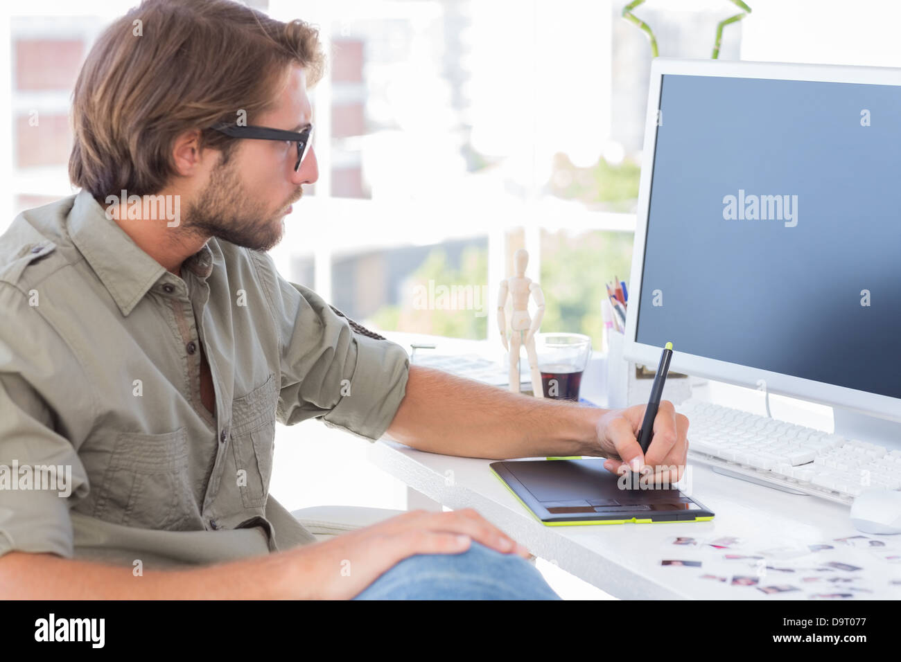 Artist using graphics tablets Stock Photo - Alamy