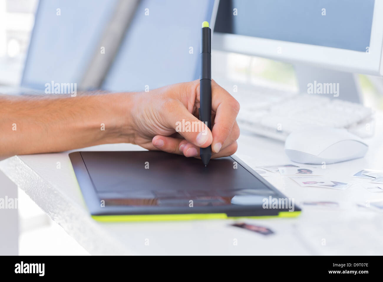 Male hands using graphics tablet Stock Photo - Alamy