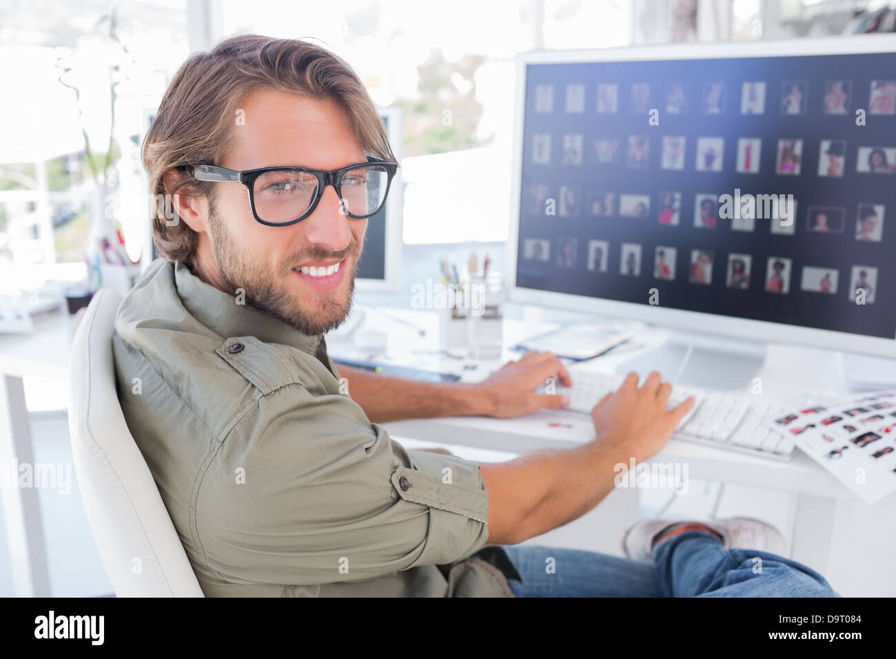 Woman turning monitor on typing hi-res stock photography and images - Alamy