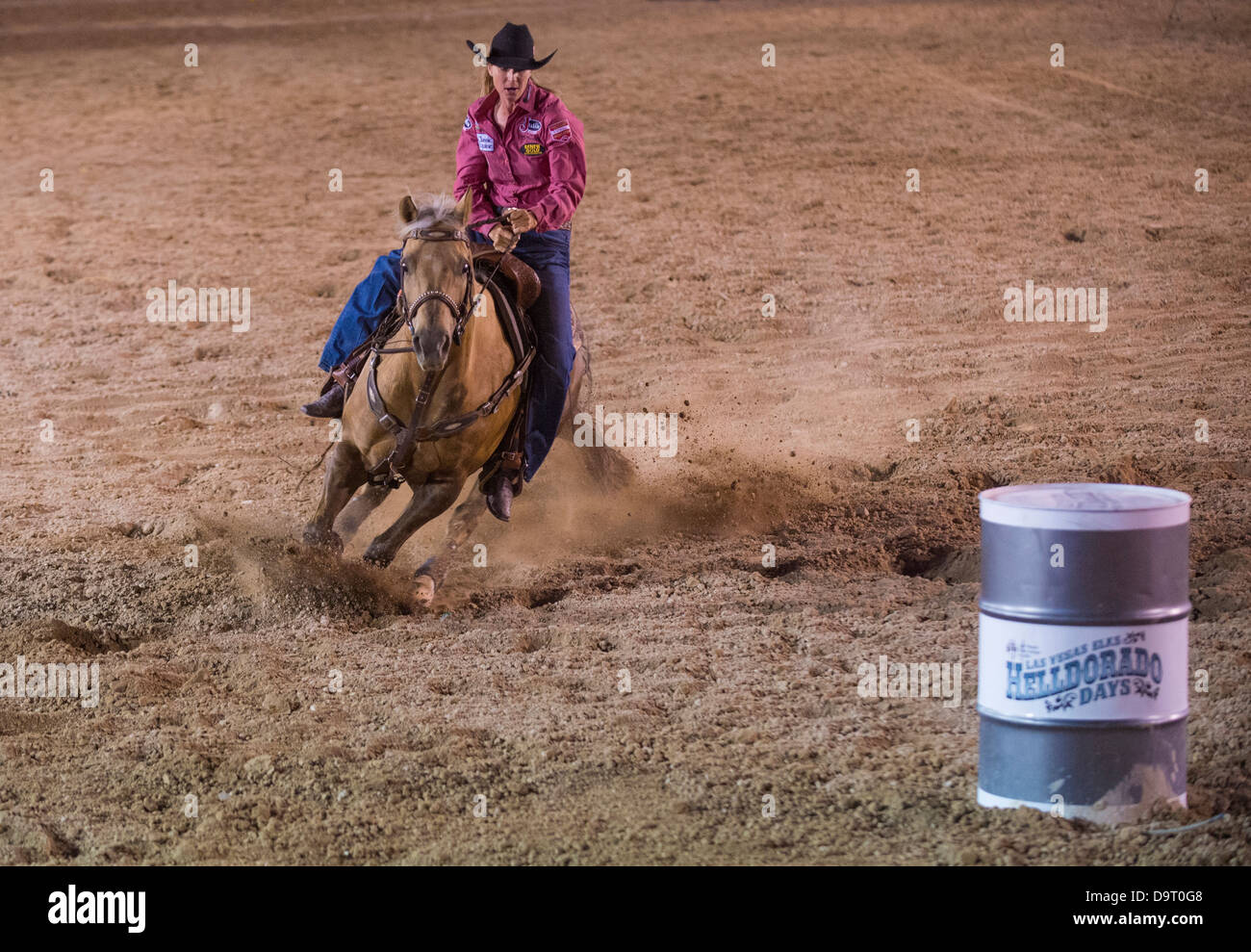 Cowgirl Participant in a Barrel racing competition at the Helldorado ...