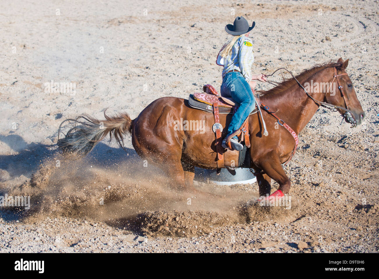 Cowgirl Participant in a Barrel racing competition at the Helldorado ...