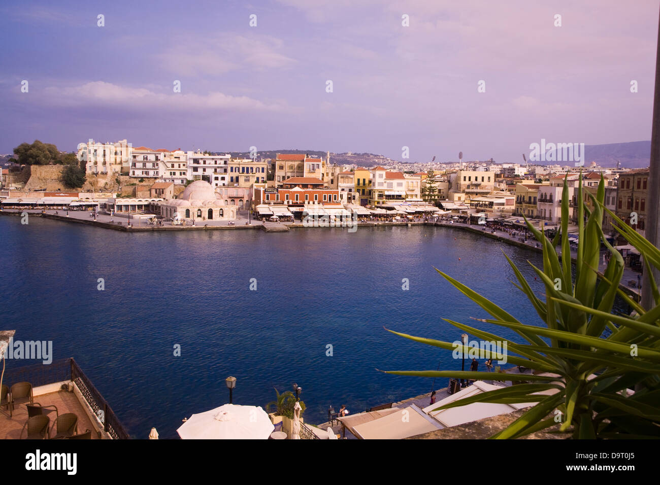 A broad promenade lined with tourist shops and cafes circles the lovely ...