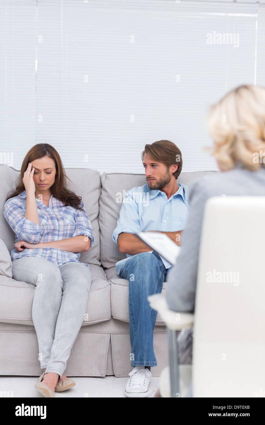 Woman crying on the couch Stock Photo - Alamy