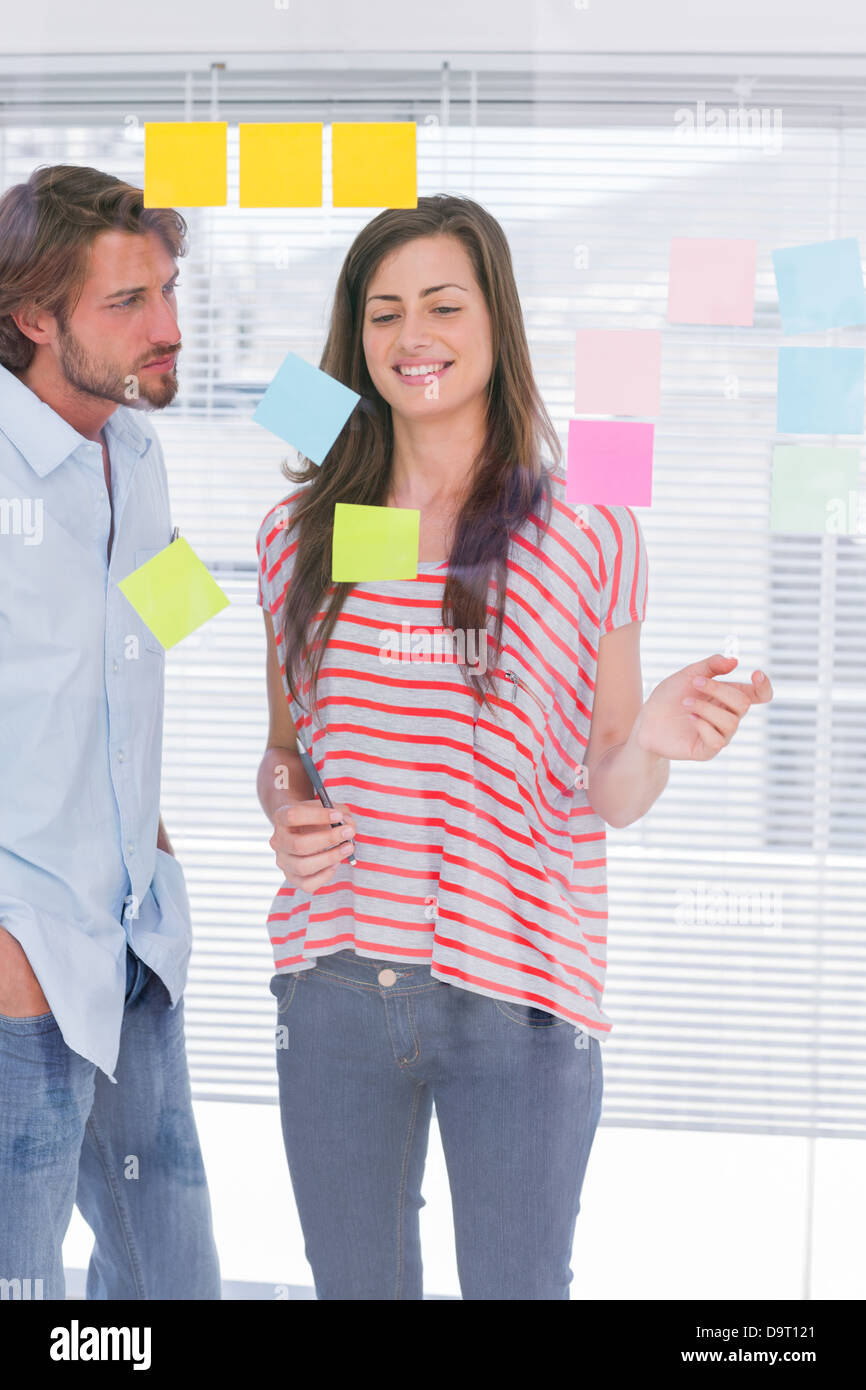 Teamwork brainstorming together Stock Photo - Alamy