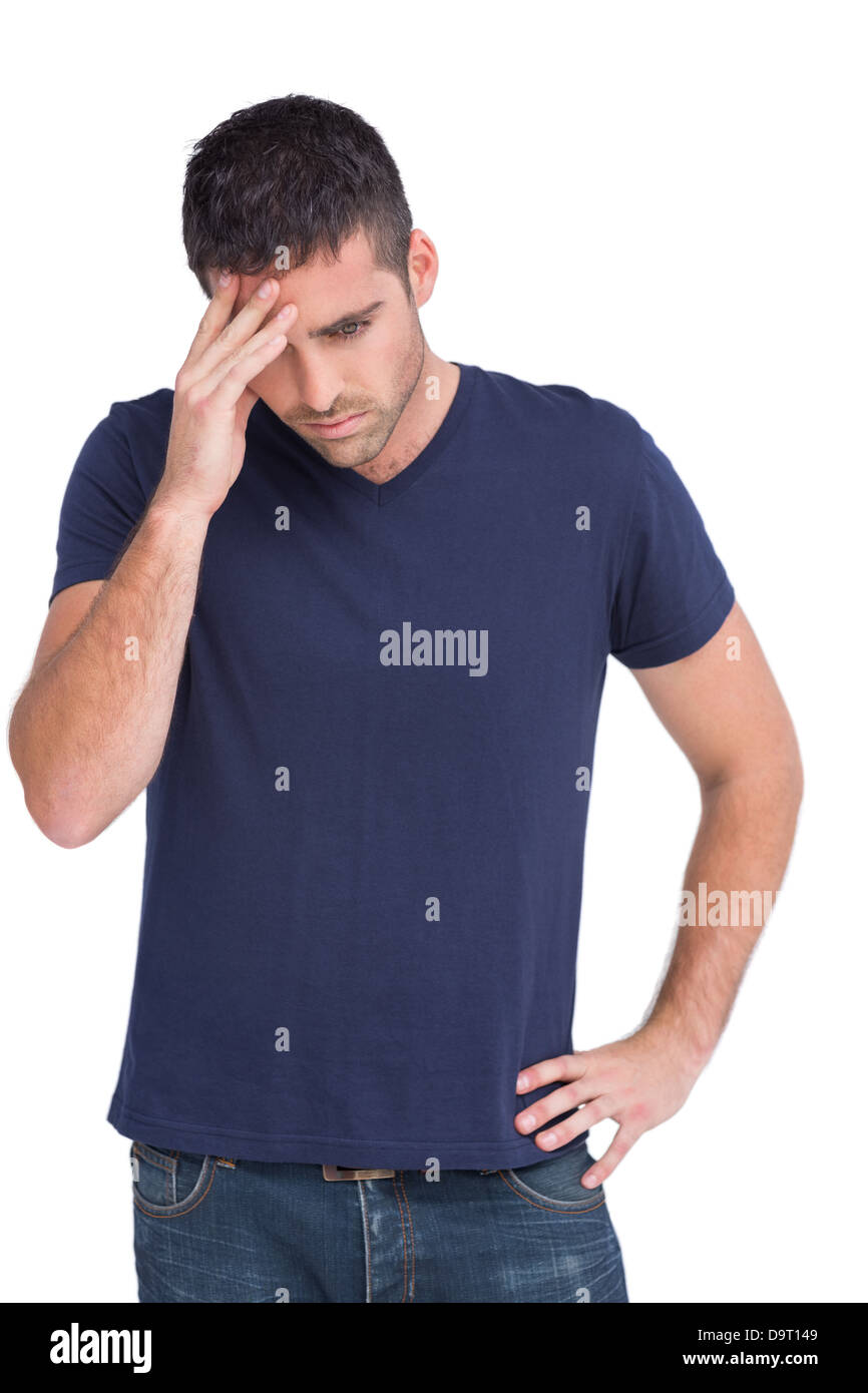 Upset man holding his forehead Stock Photo - Alamy