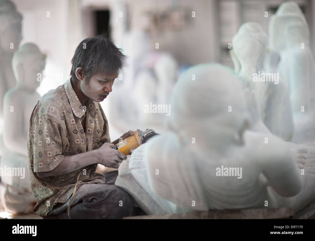 a stone mason working on marble Buddhas, Mandalay, Myanmar (Burma Stock ...
