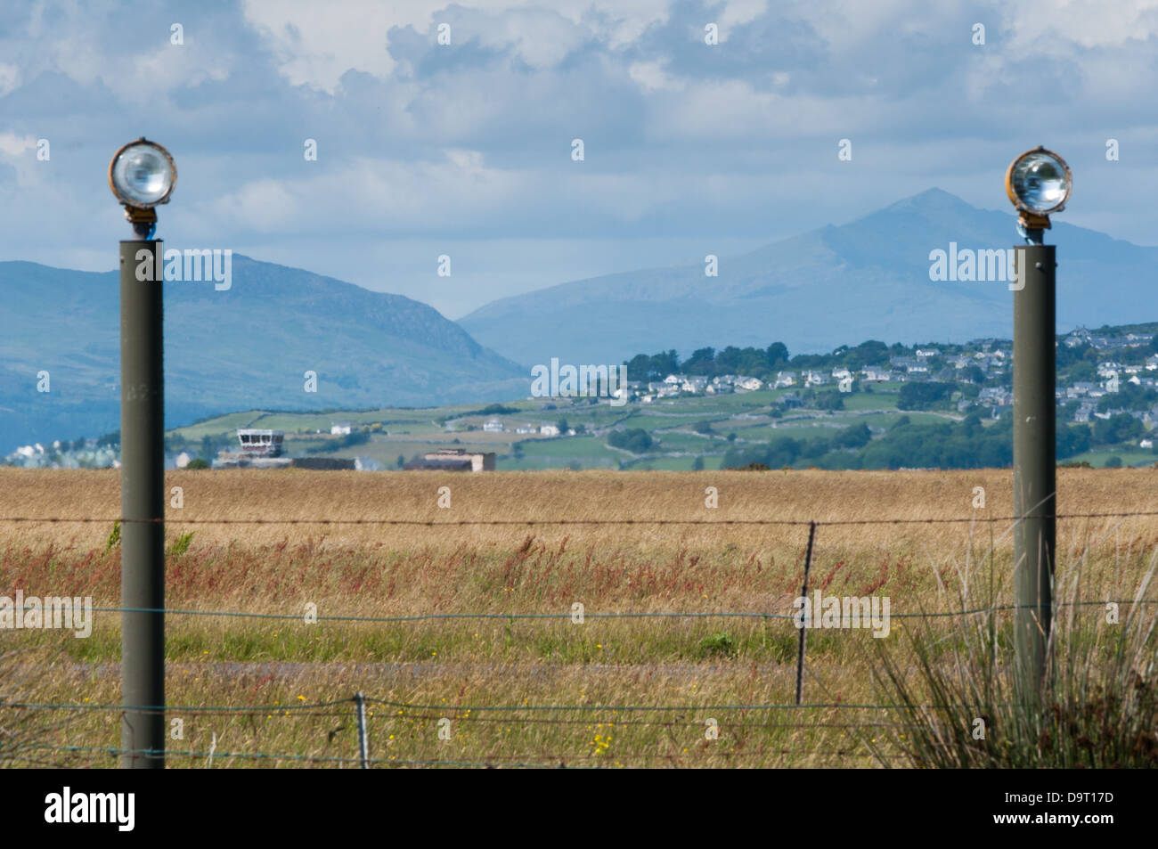Mount Snowdon towers over the village and air traffic control tower ...