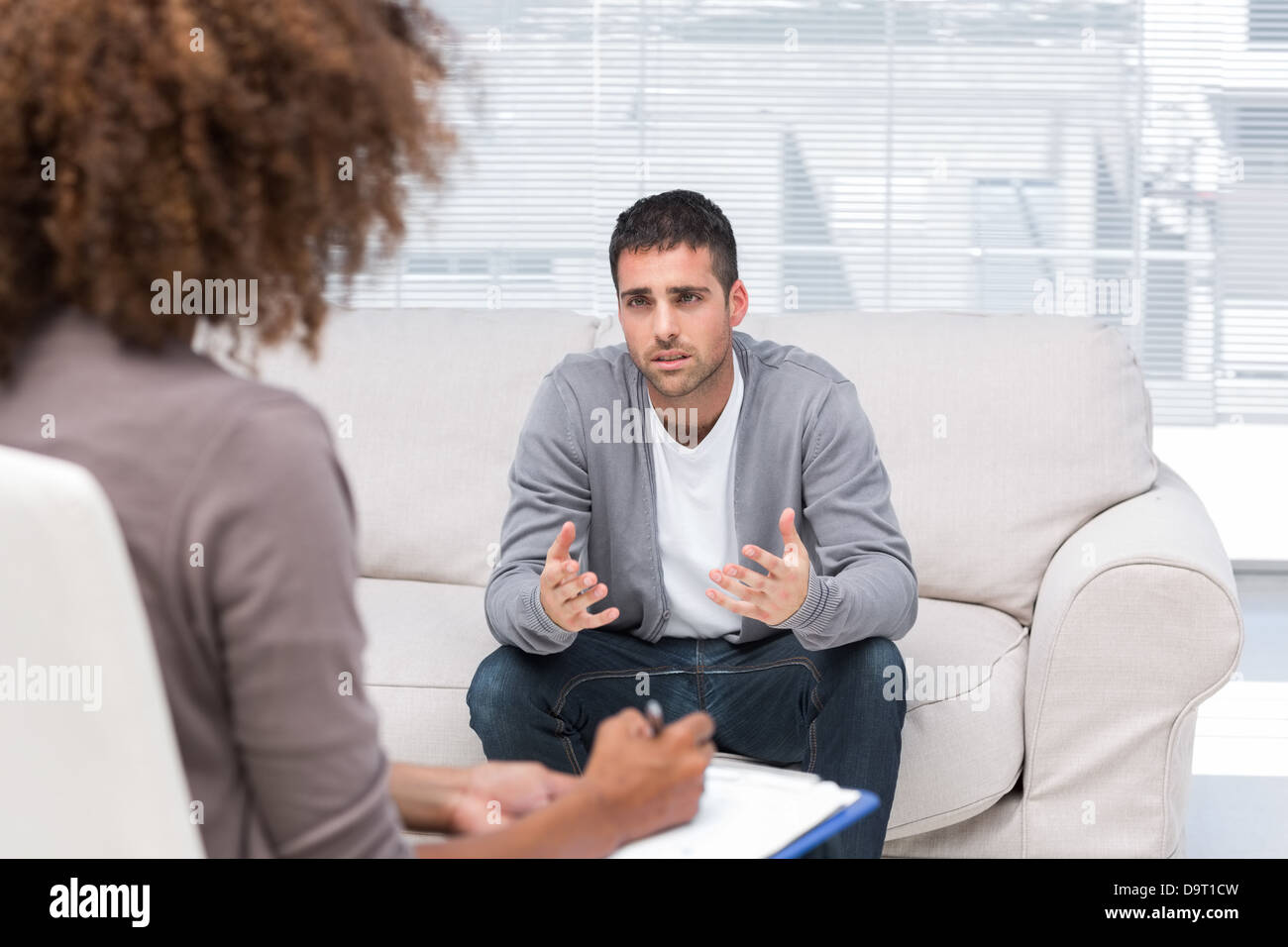 Sad man writing hi-res stock photography and images - Alamy