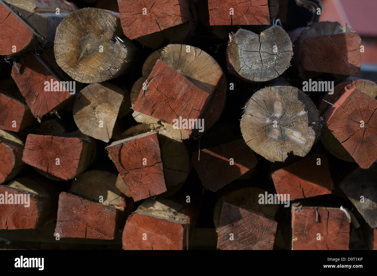Structure of red stacked wood boards Stock Photo - Alamy