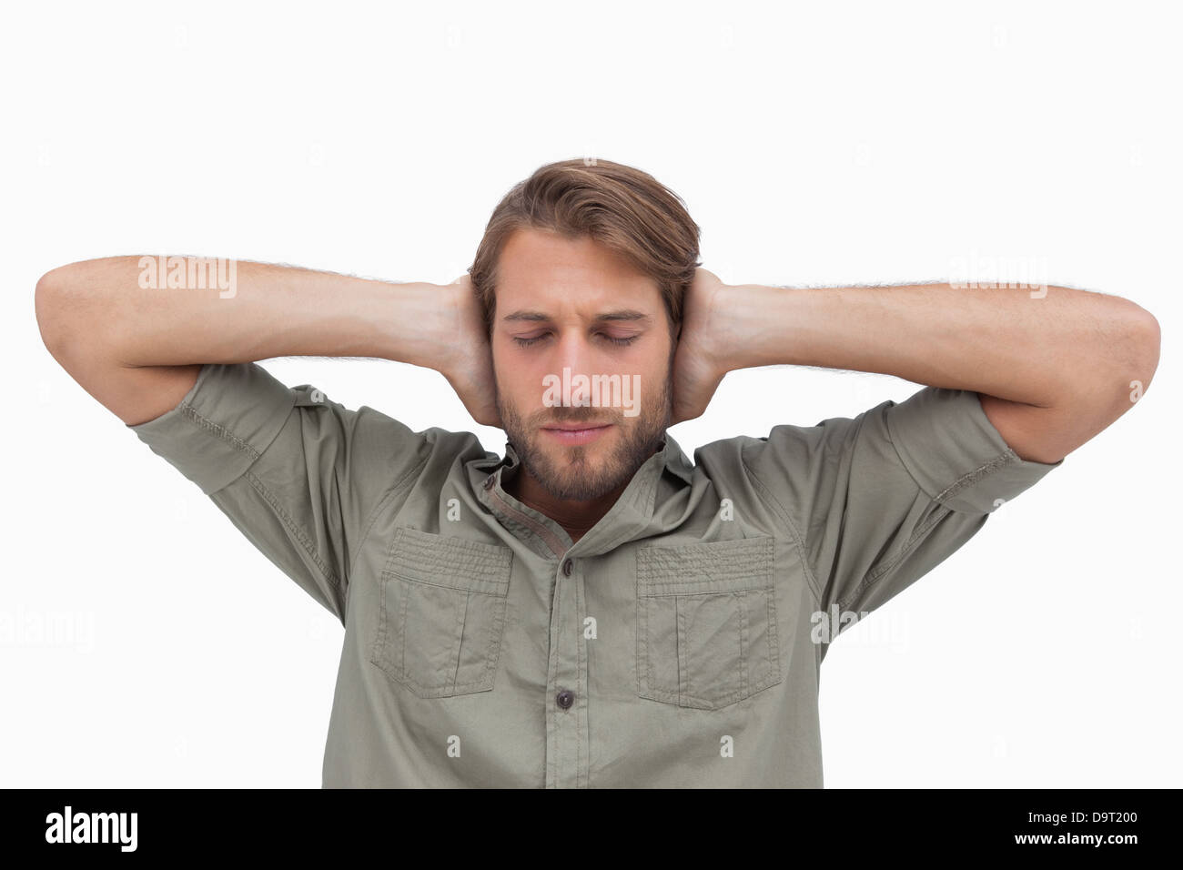 Man blocking his ears and closing his eyes Stock Photo - Alamy