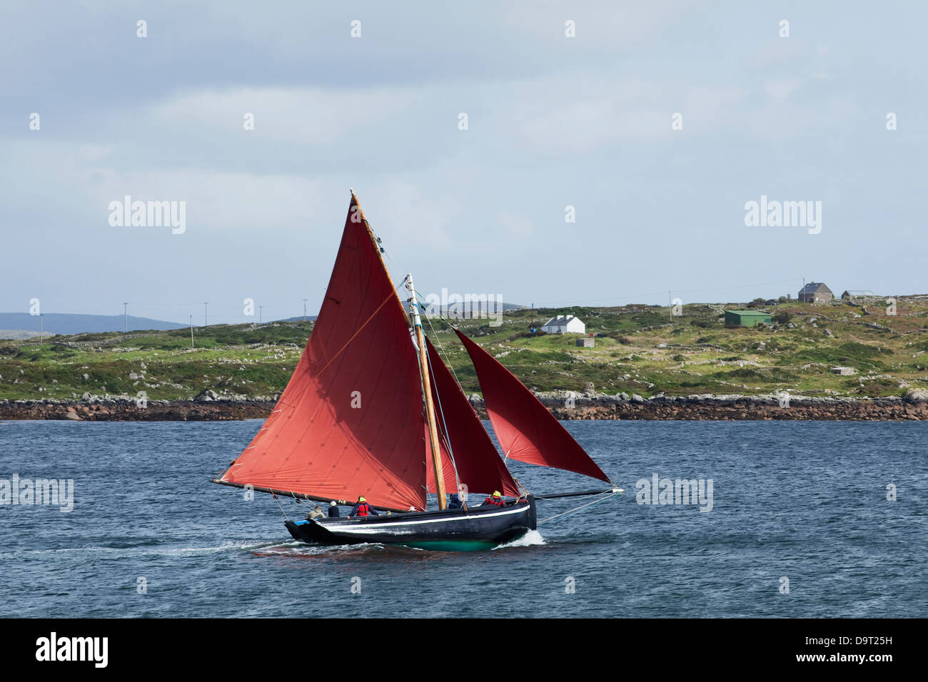 A sailboat in the water for the roundstone regatta;Roundstone county ...