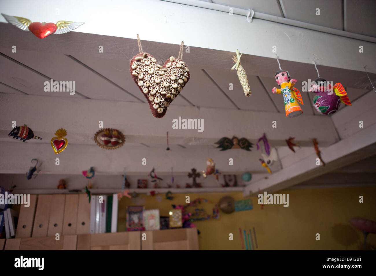 Hand made folk craft hanging from a ceiling Stock Photo - Alamy