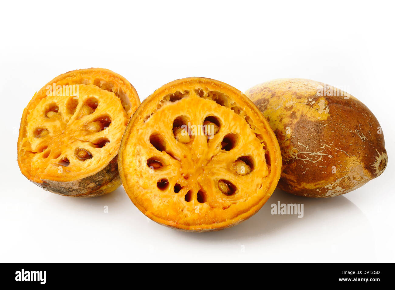 ripe bael fruit on white background Stock Photo - Alamy