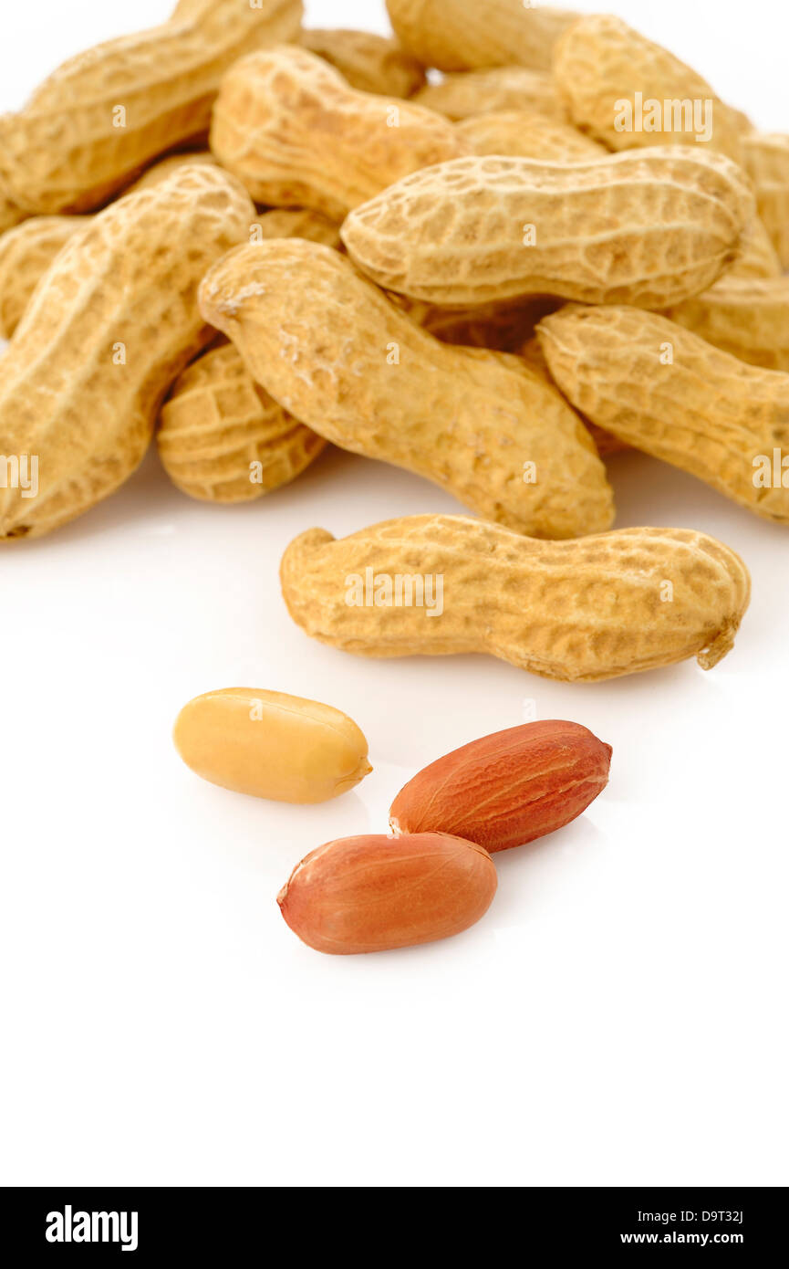 Peanuts on white background Stock Photo - Alamy