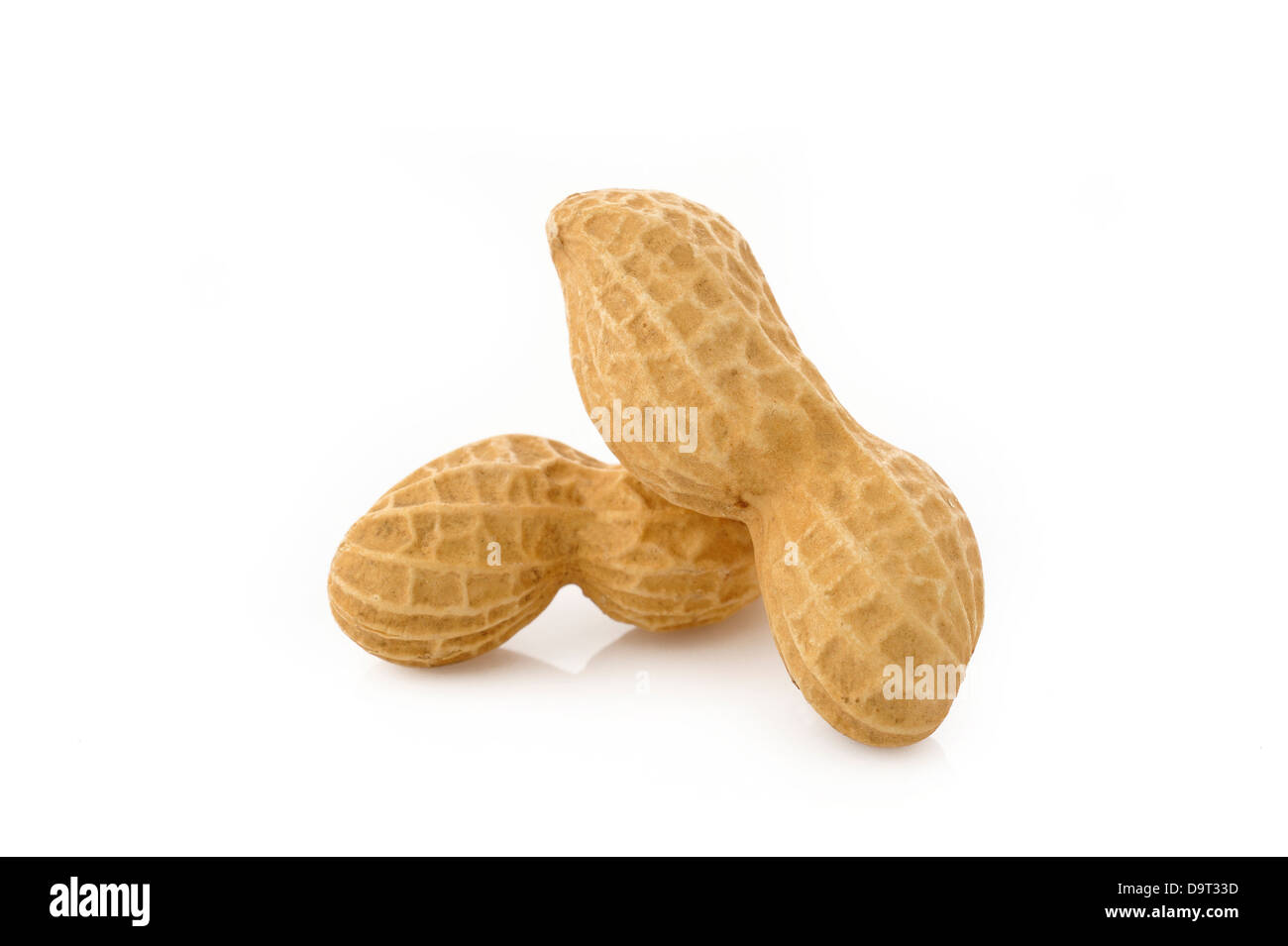 Peanuts on white background Stock Photo - Alamy