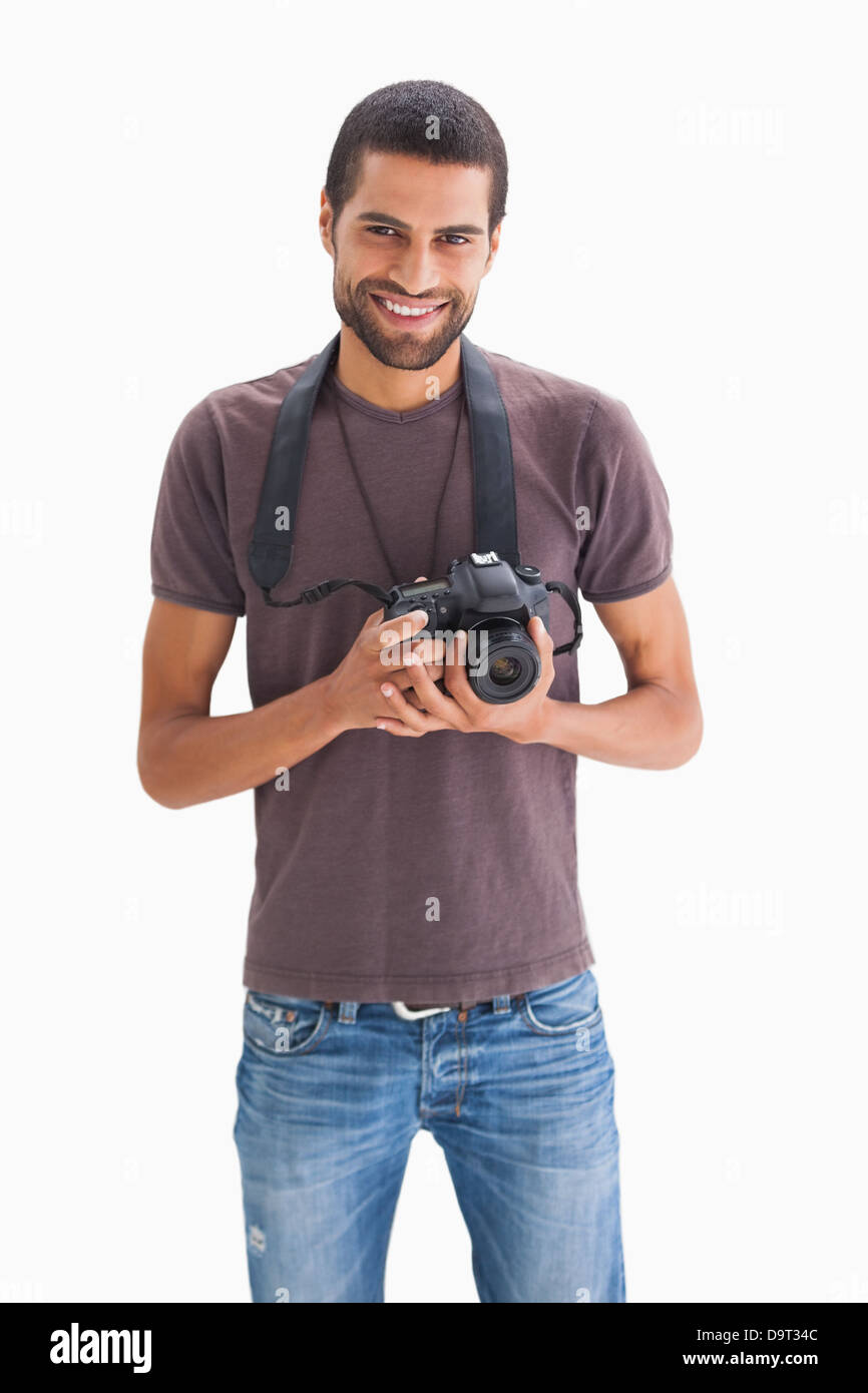 Happy photographer looking camera Cut Out Stock Images & Pictures - Alamy