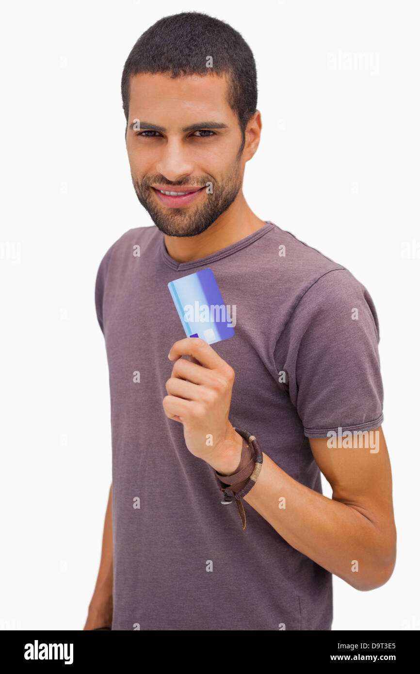 Happy man holding credit card Stock Photo - Alamy