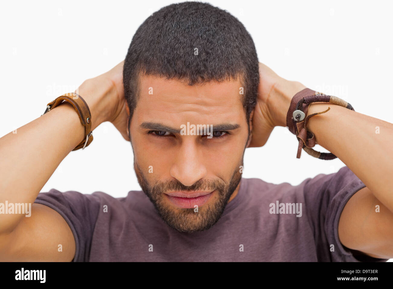 Man looking at camera, hands on head hi-res stock photography and ...
