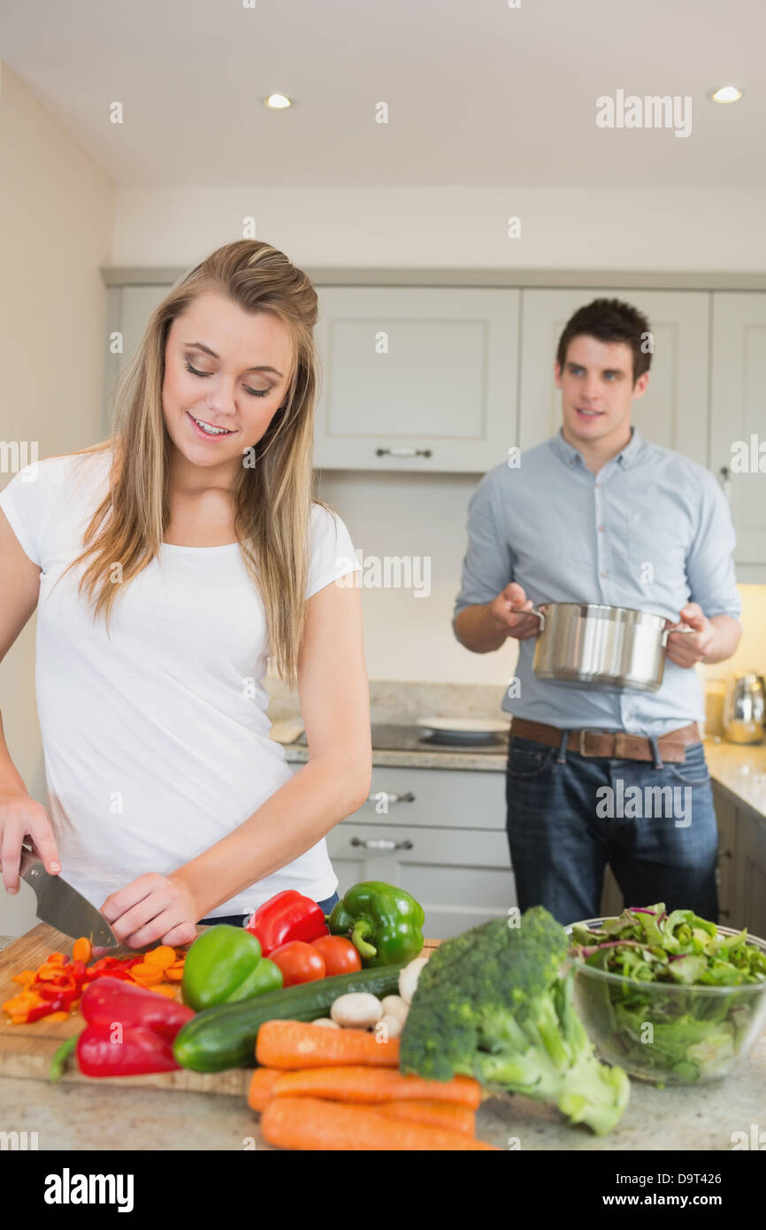 Young couple preparing dinner Stock Photo - Alamy