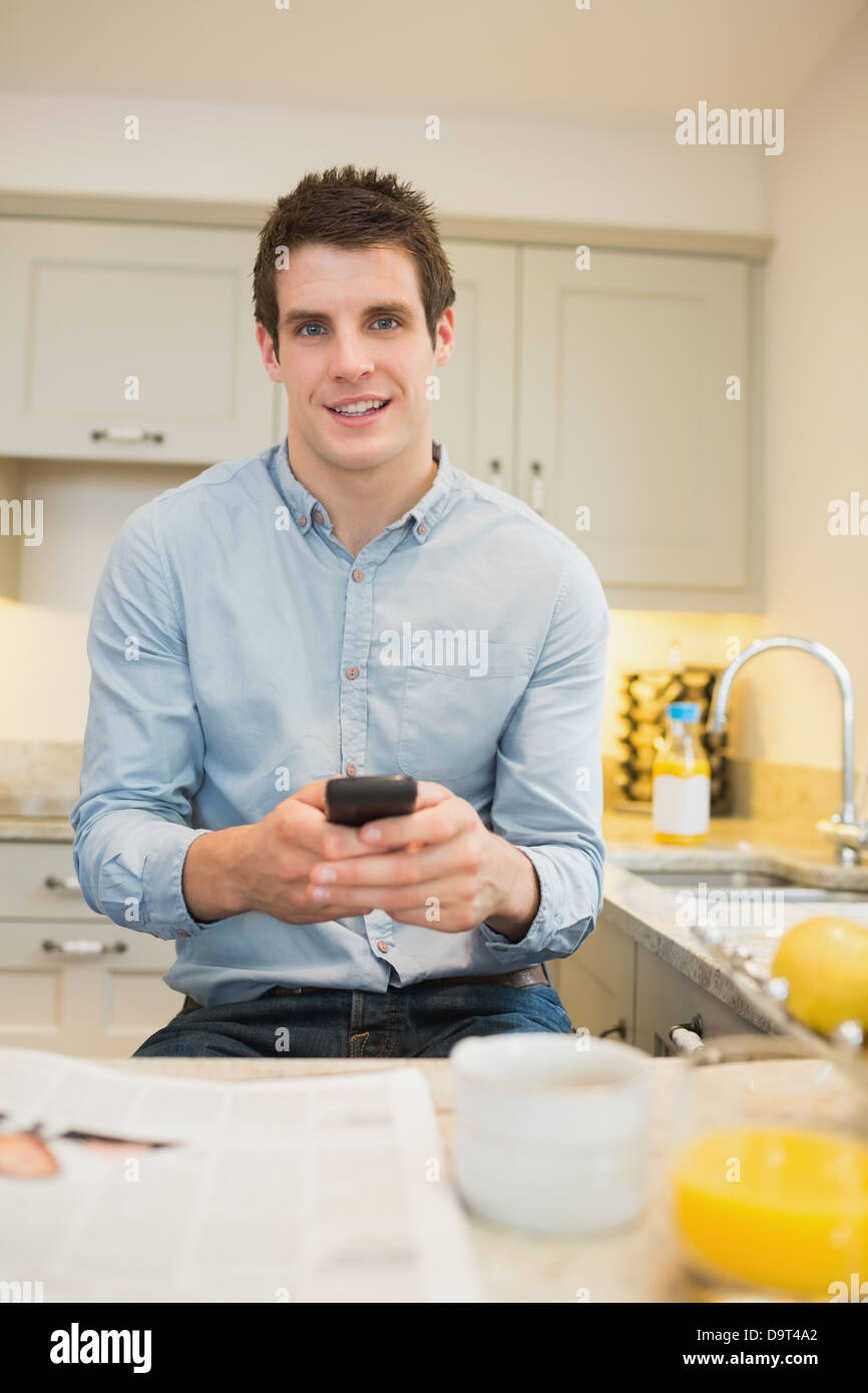 Man texting on his mobile phone Stock Photo - Alamy