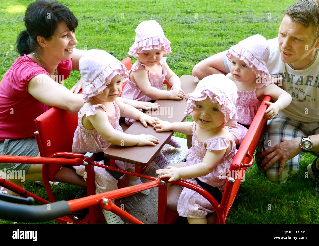 Identical quadruplets hi-res stock photography and images - Alamy
