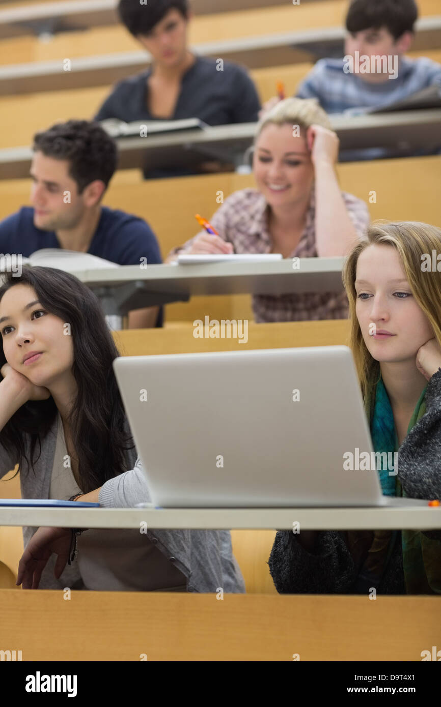 Listening students in a lecture hall Stock Photo - Alamy
