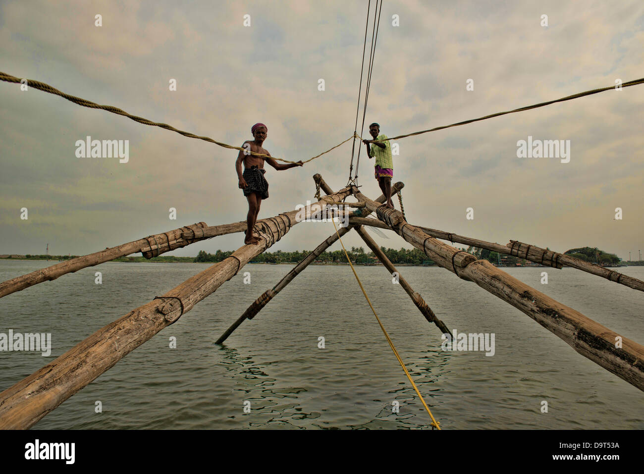 working the Chinese fishing nets in Fort Cochin (Kochi) in Kerala ...