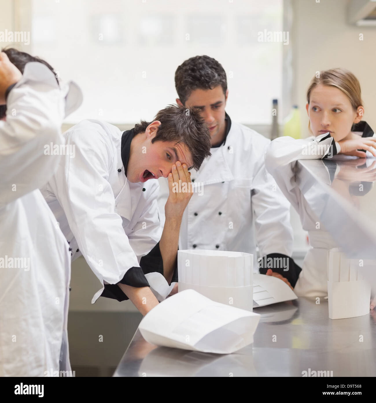 Kitchen chef tired female hi-res stock photography and images - Alamy