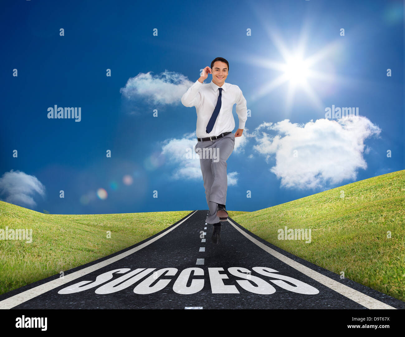 Happy businessman running on a road Stock Photo - Alamy