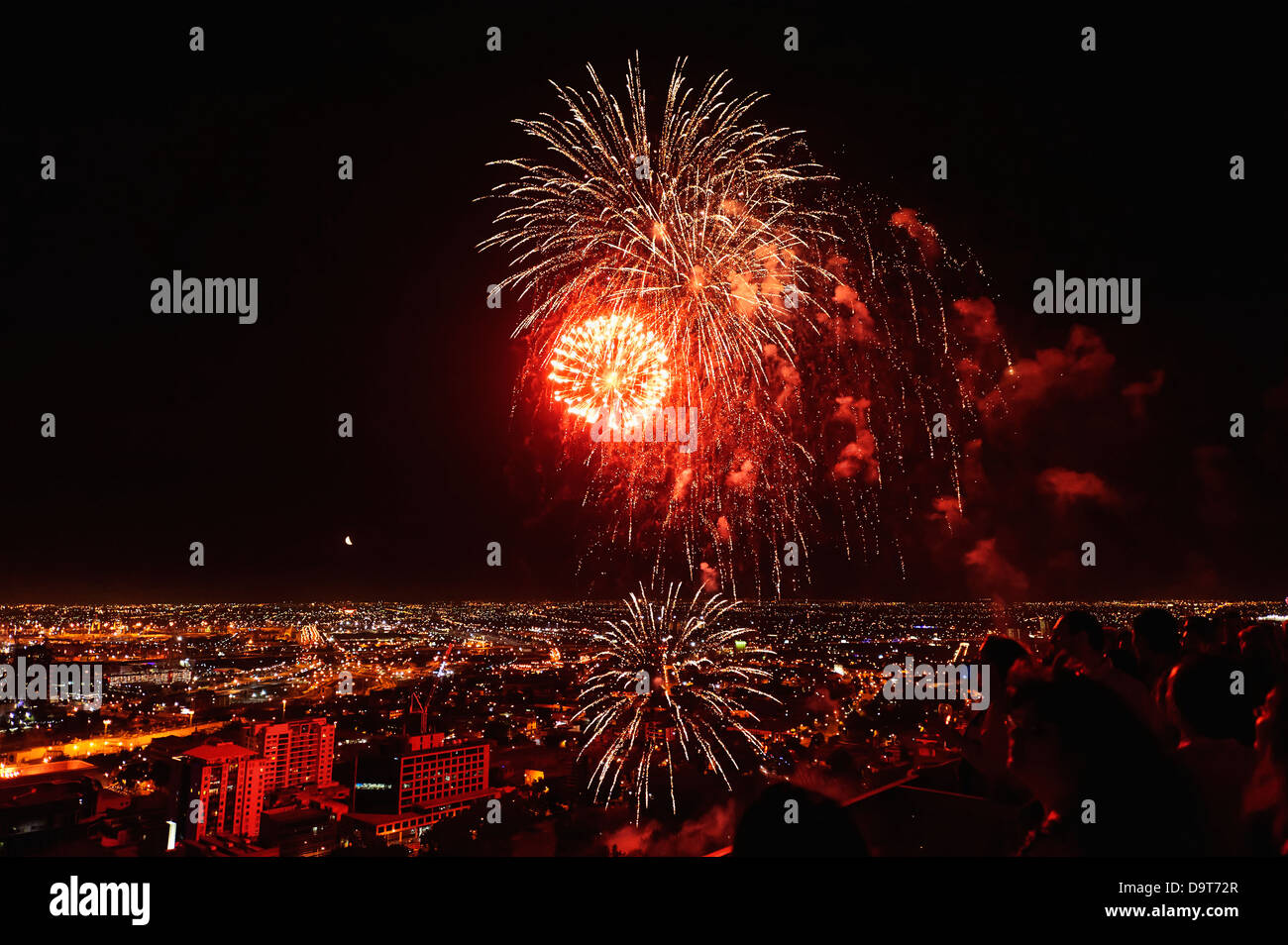 Spectacular fireworks photographed from atop a skyscraper light up the ...