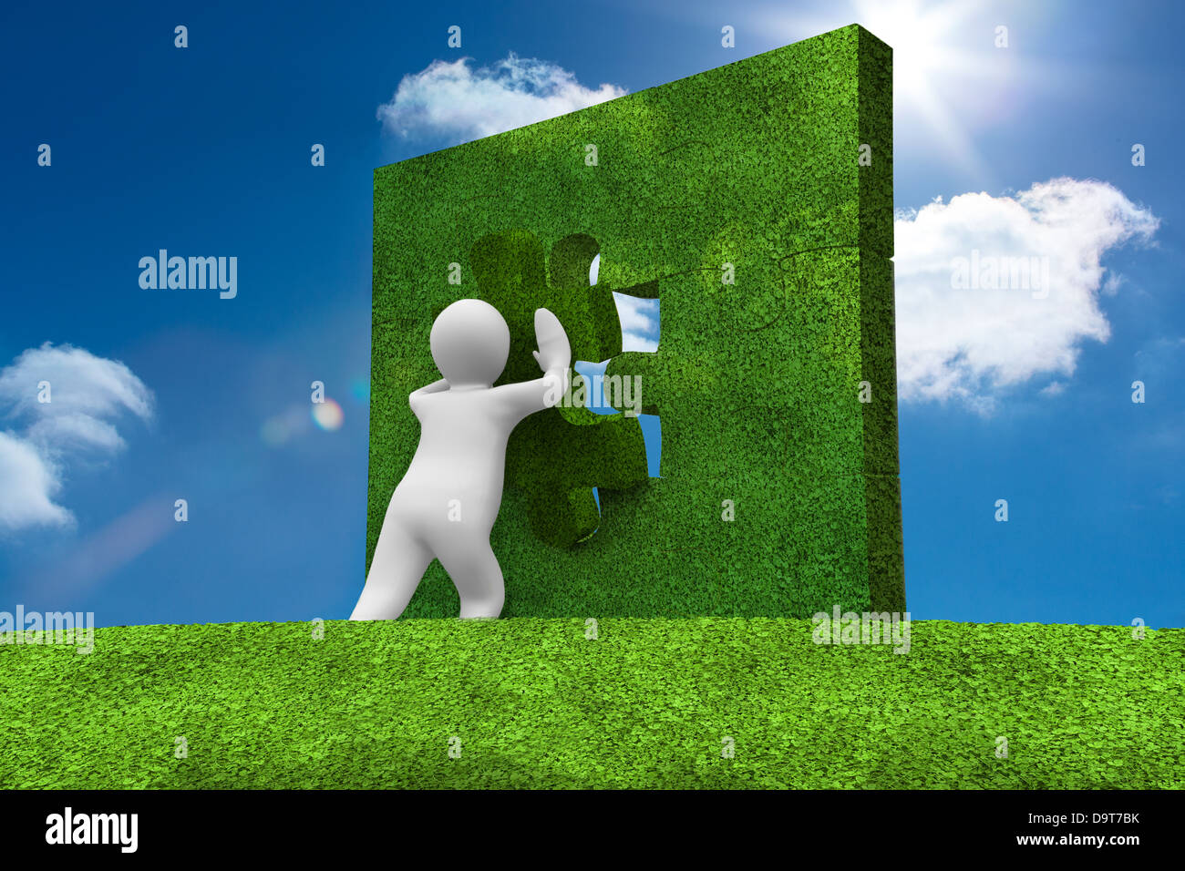 Little white character resolving a puzzle Stock Photo - Alamy