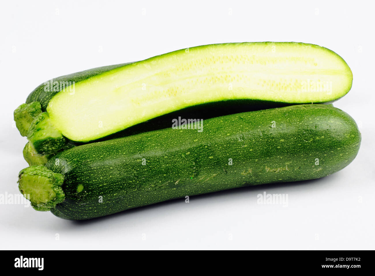 zucchini or courgette on the white background Stock Photo - Alamy
