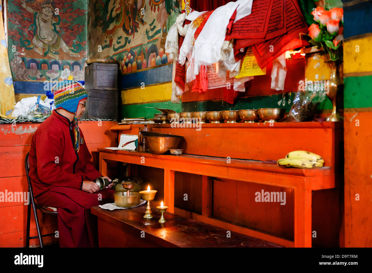 A monk chanting prayers in the Yiga Choling Gompa (monastery) in Ghum ...