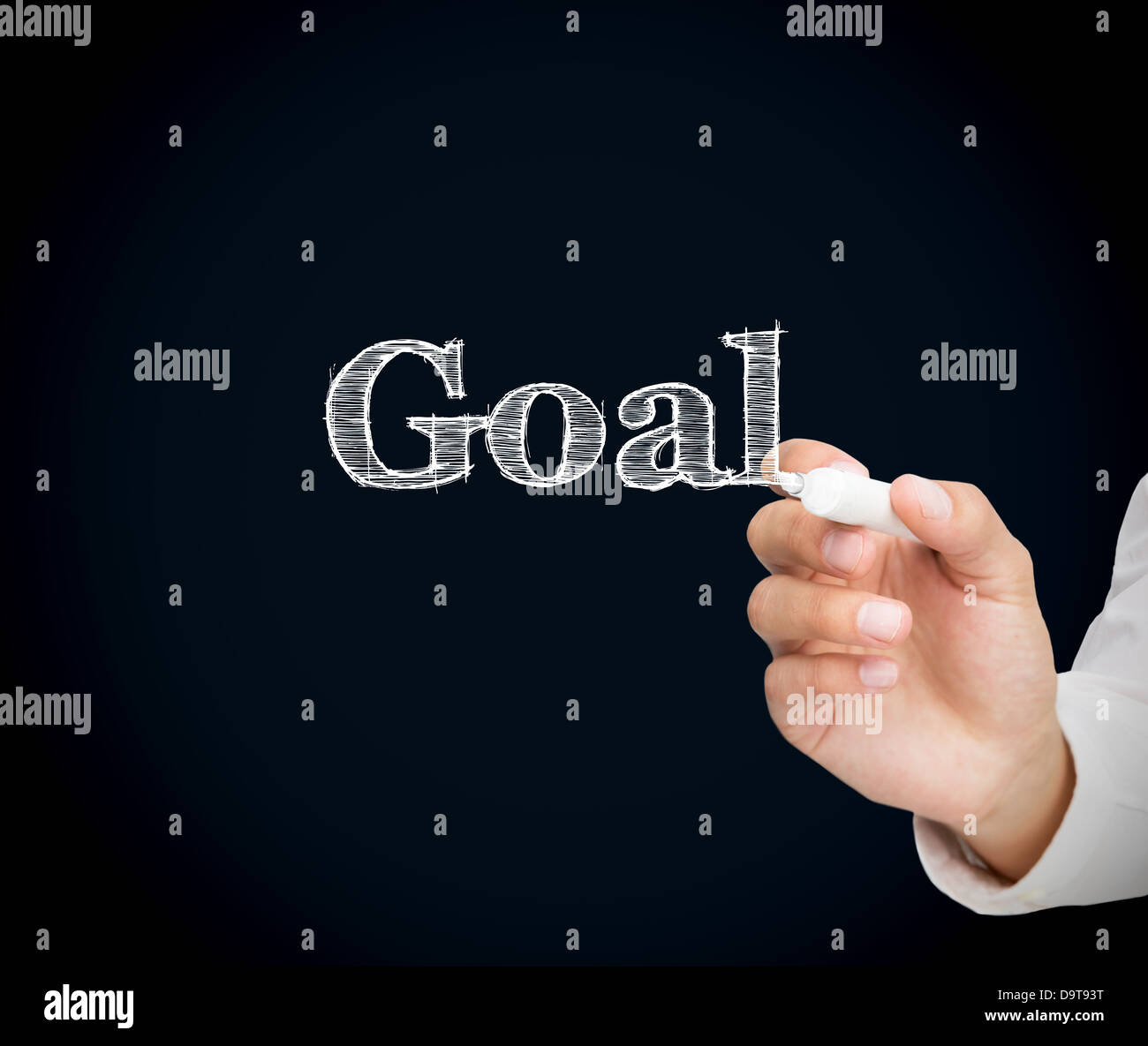 Woman writing goal on a blackboard Stock Photo - Alamy