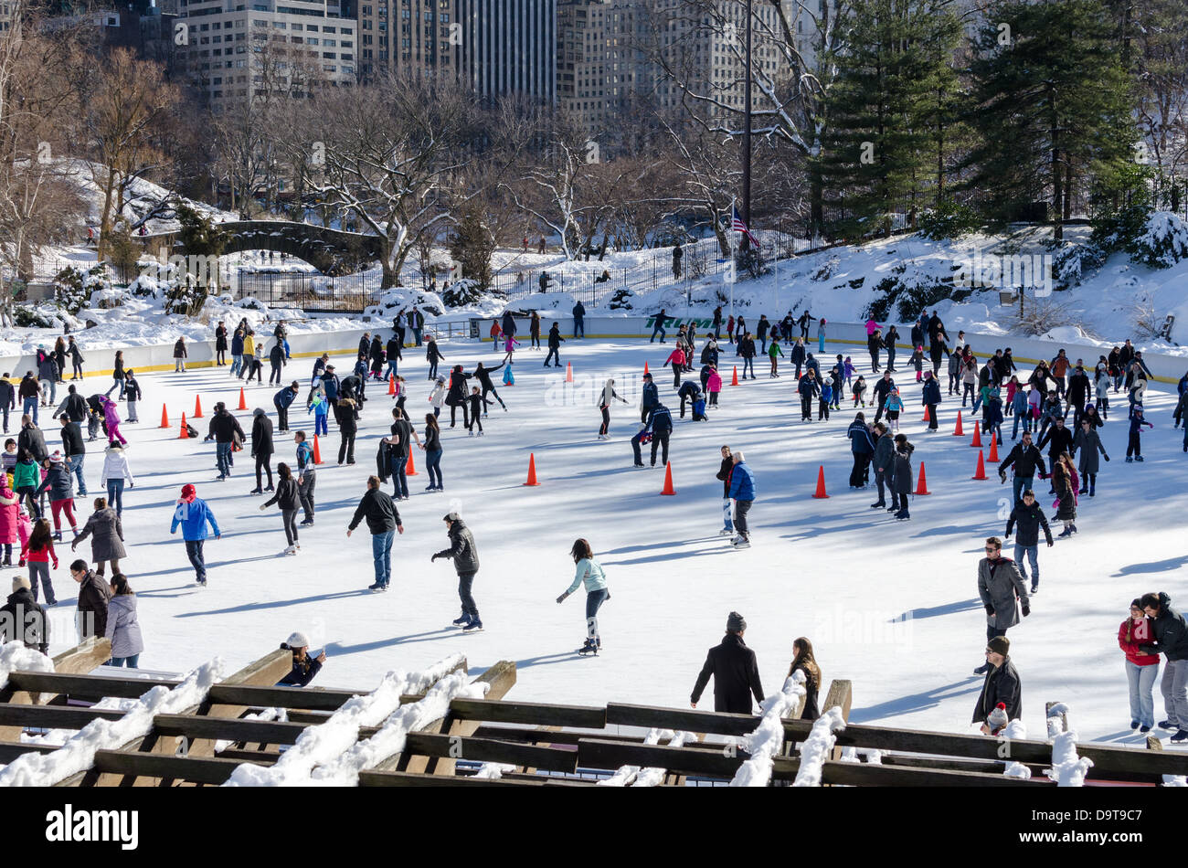 Ice skating at snow covered Central Park in winter Stock Photo - Alamy