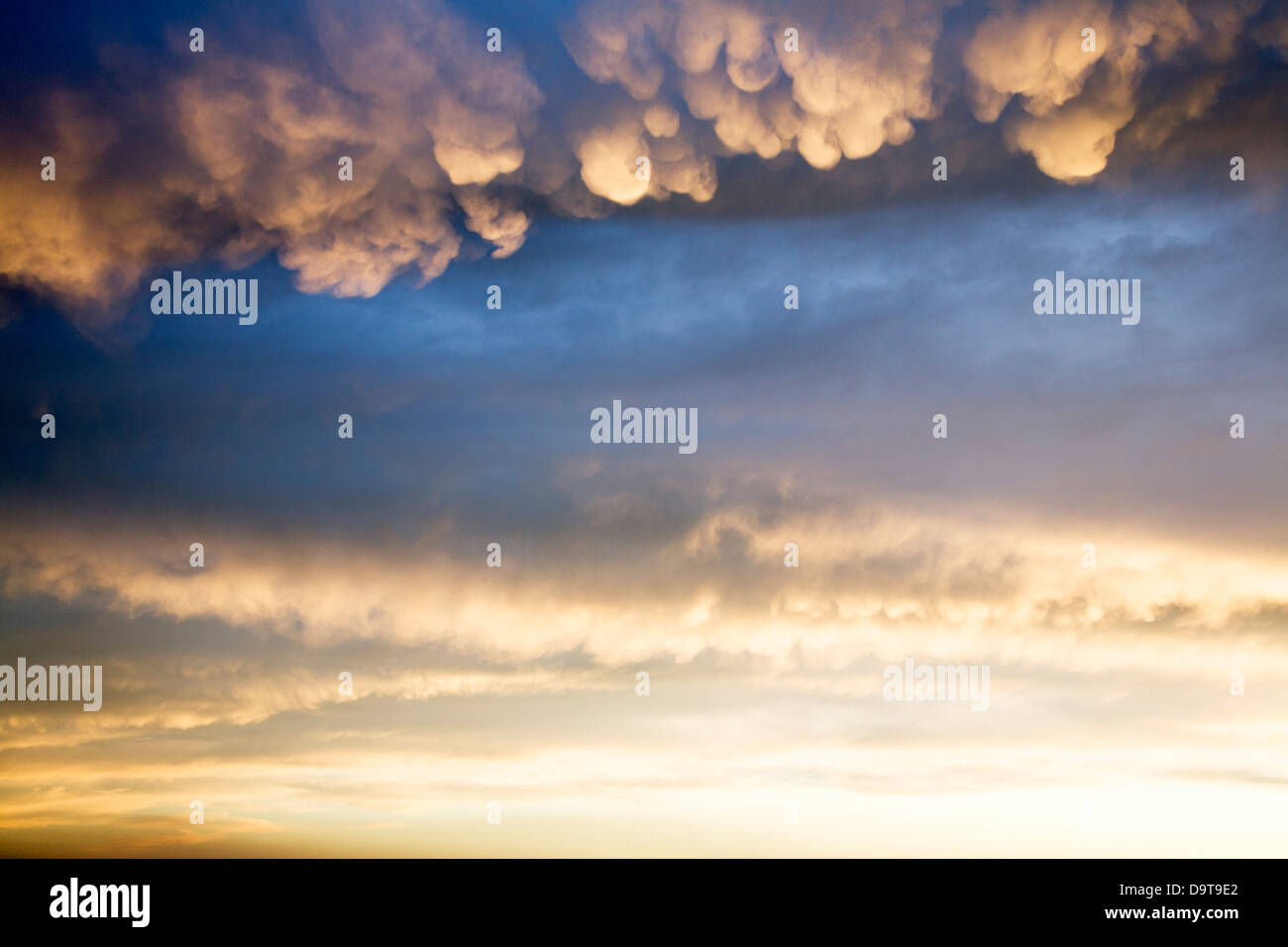 A spectacular display of Cumulonimbus with Mammatus clouds at sunset ...