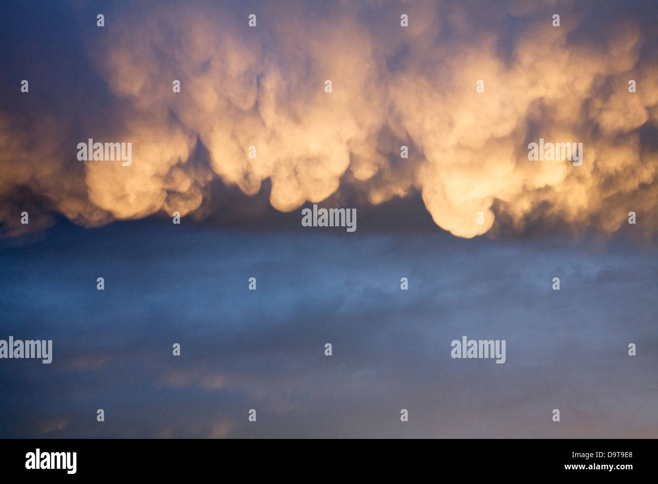 A spectacular display of Cumulonimbus with Mammatus clouds at sunset ...