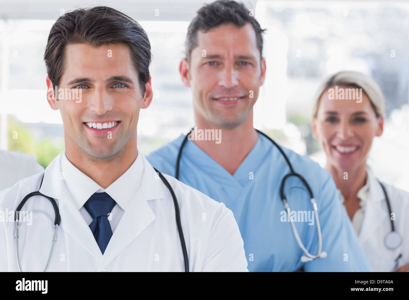 Three cheerful doctors Stock Photo - Alamy