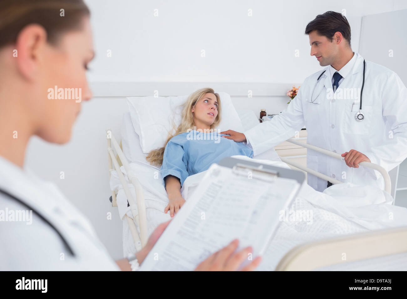 Attractive doctor and patient hi-res stock photography and images - Alamy