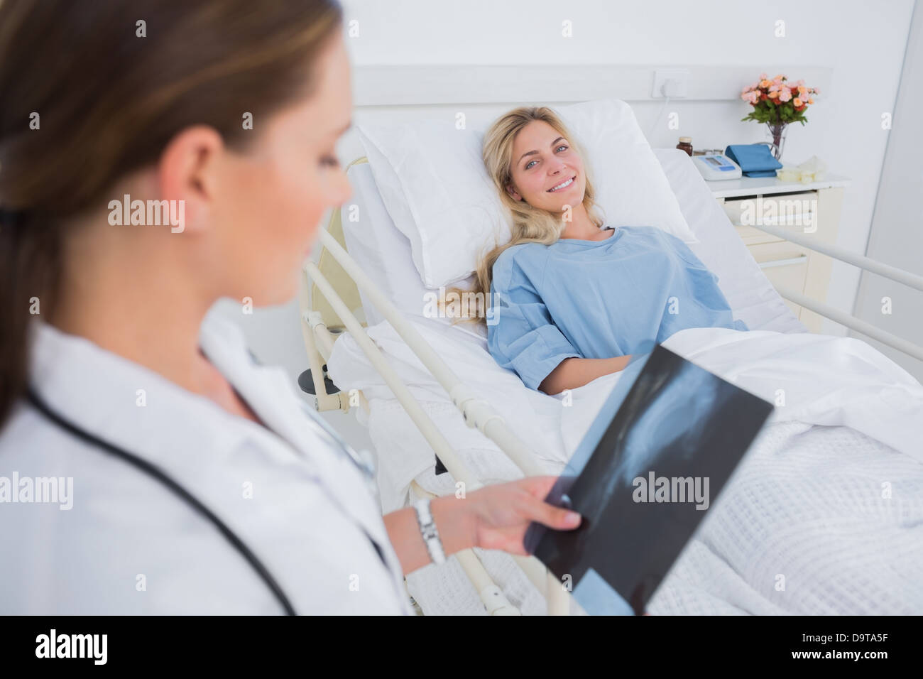 Doctor holding xray Stock Photo - Alamy