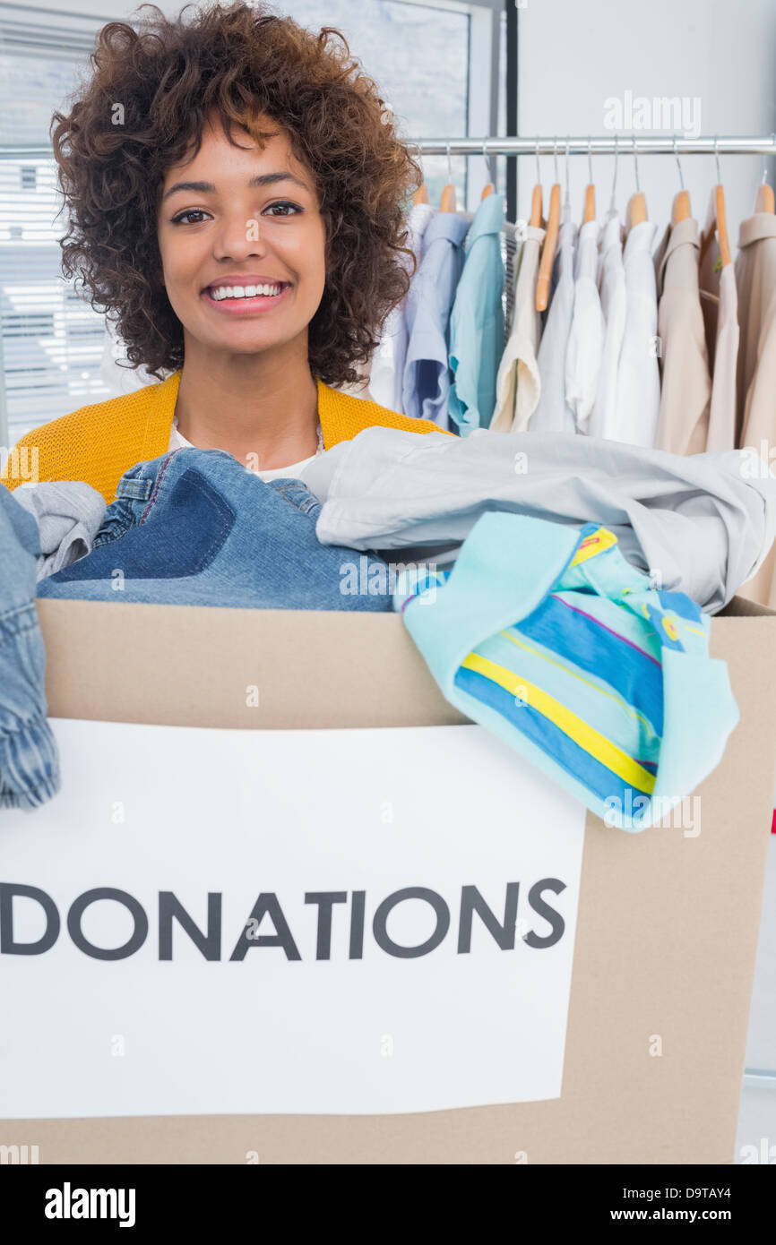 Attractive woman participating at charity Stock Photo - Alamy