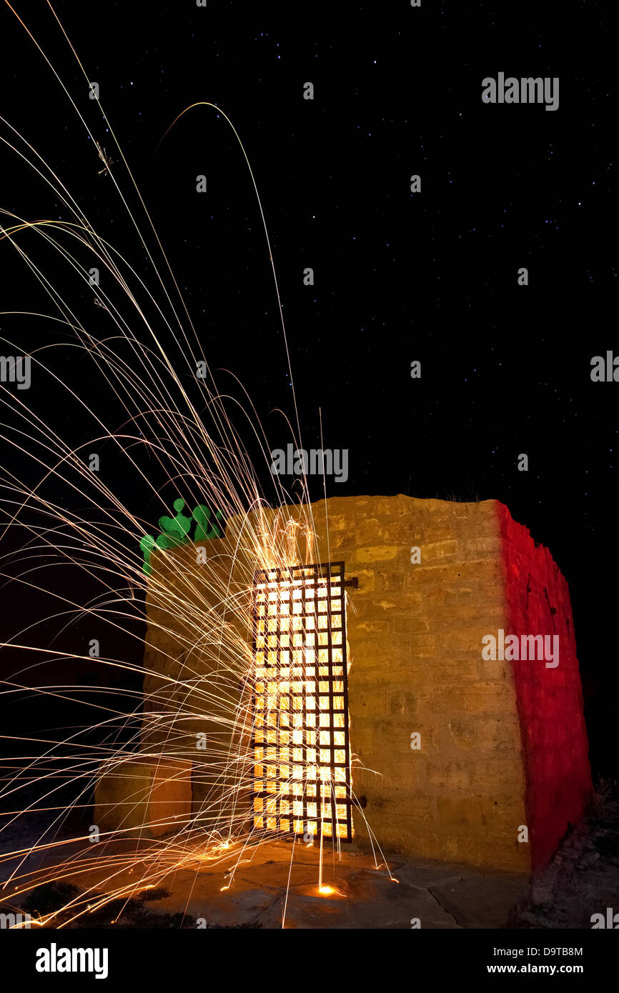 Old western jail cell under a night time sky painted with light, Texas ...