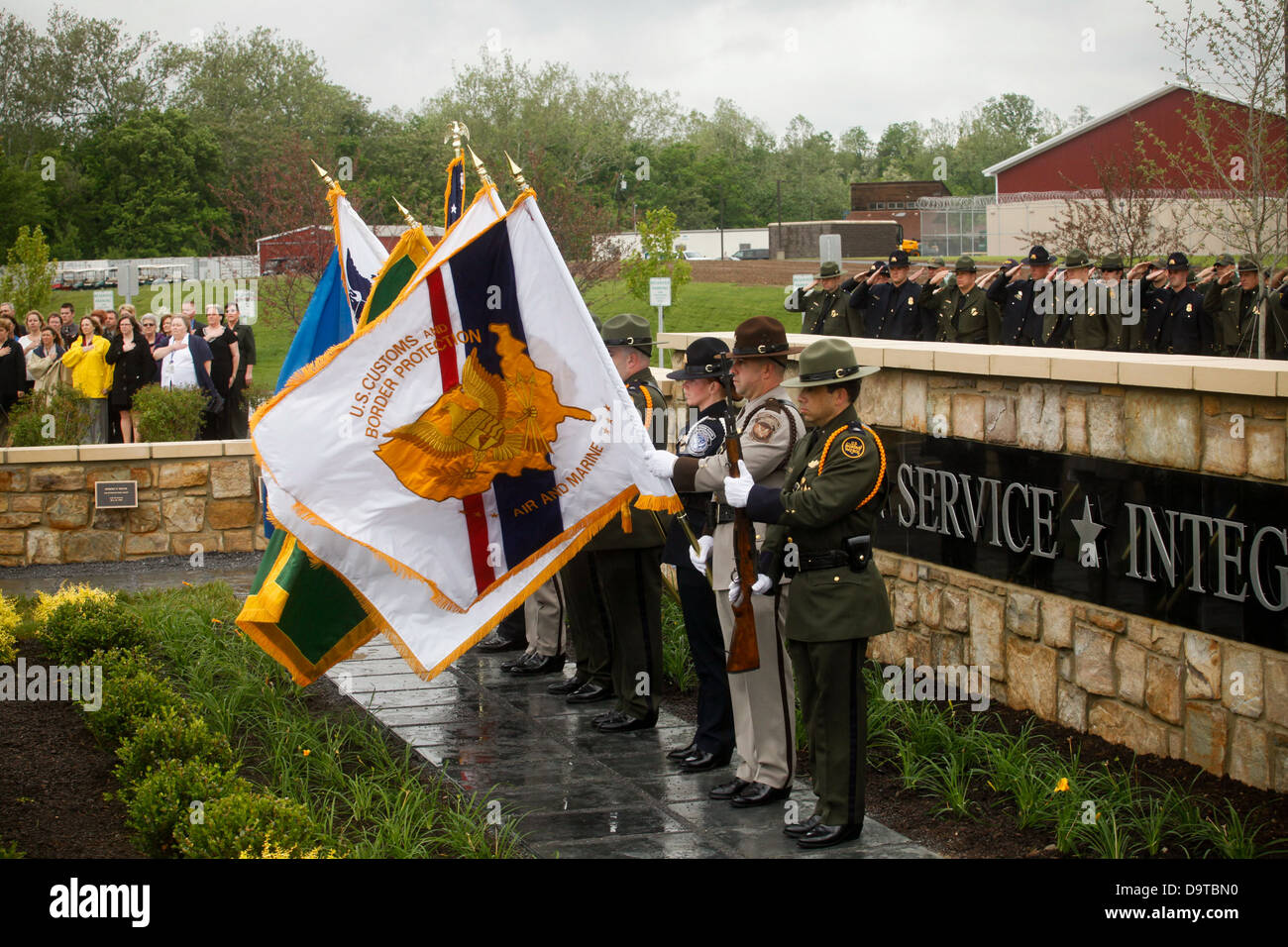 This photo captures the memorial dedication at the CBP Global College ...