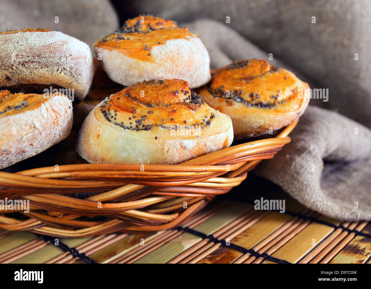 buns with poppy in basket Stock Photo - Alamy