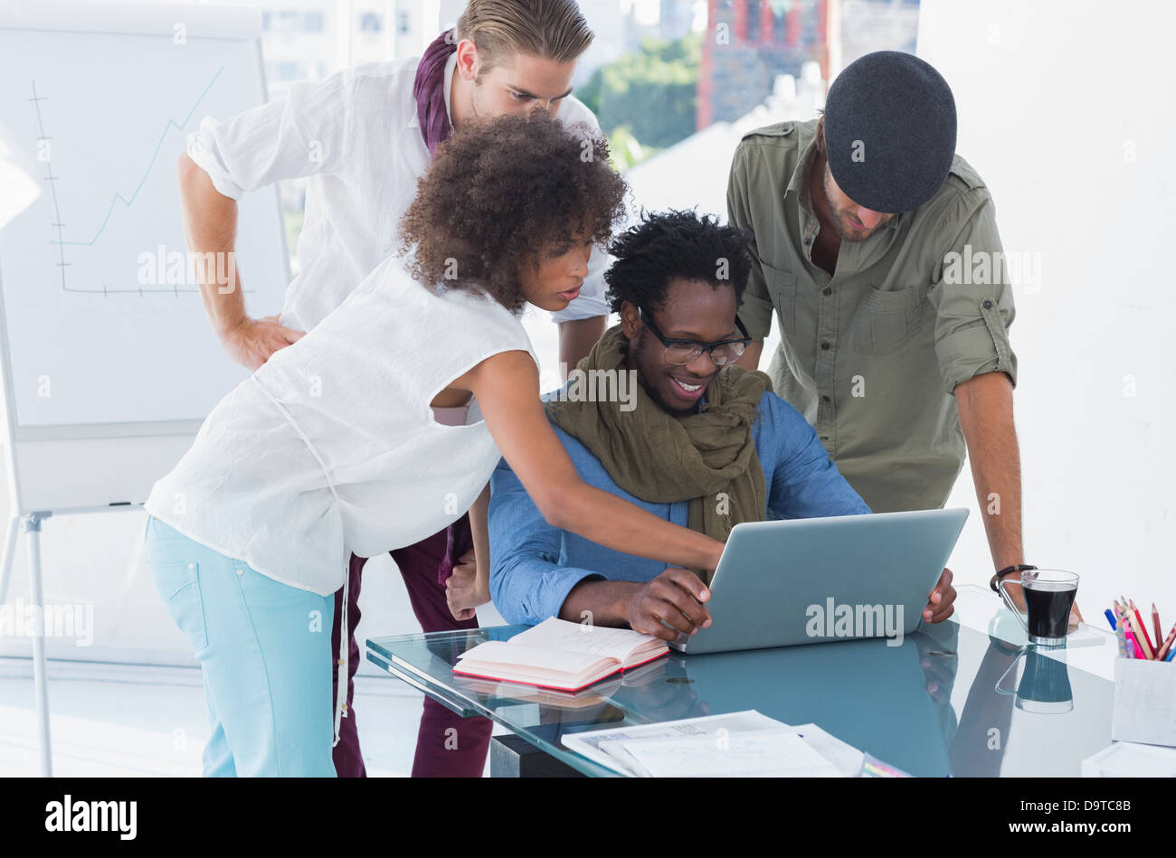 Creative designers using laptop Stock Photo - Alamy